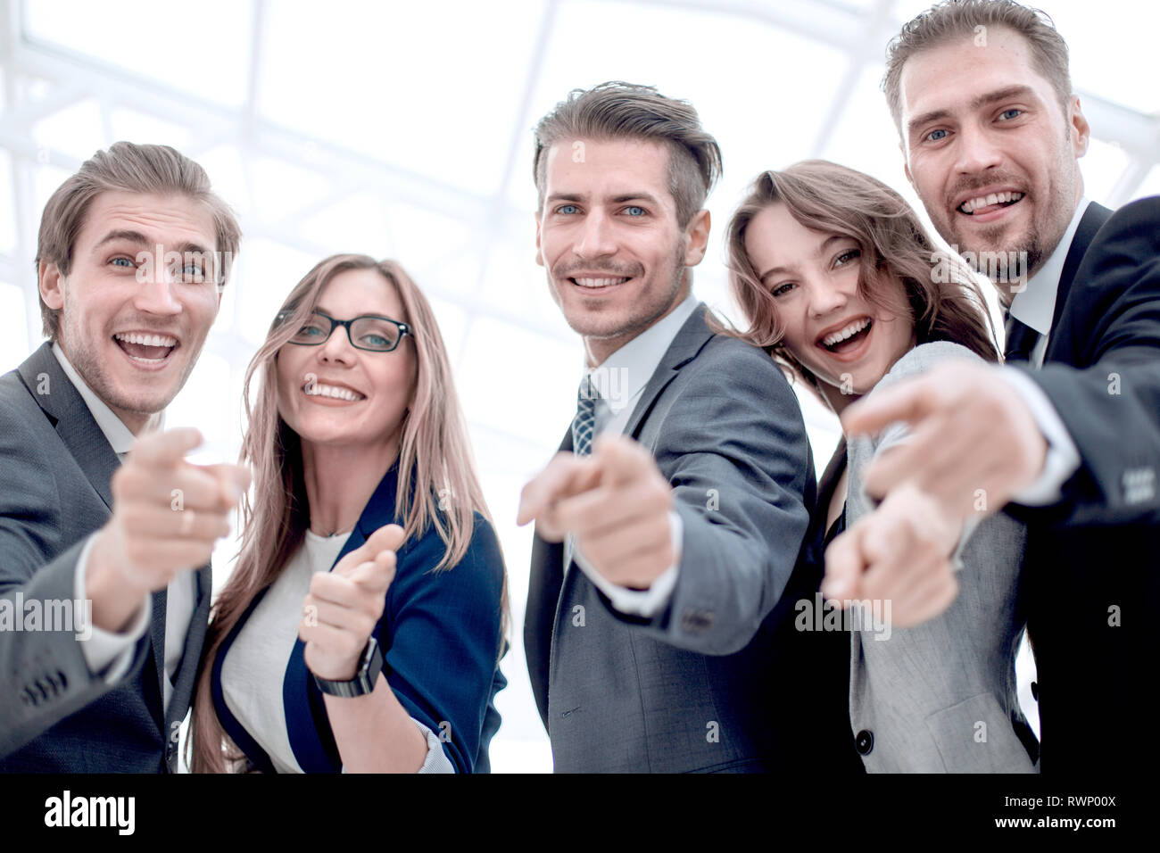 Group of people hands together Stock Photo - Alamy