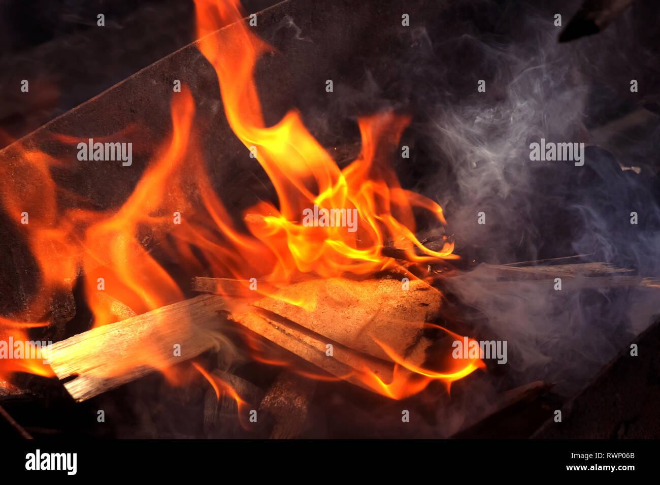paper and wood burning. photography fire close-up. fire - an accident ...