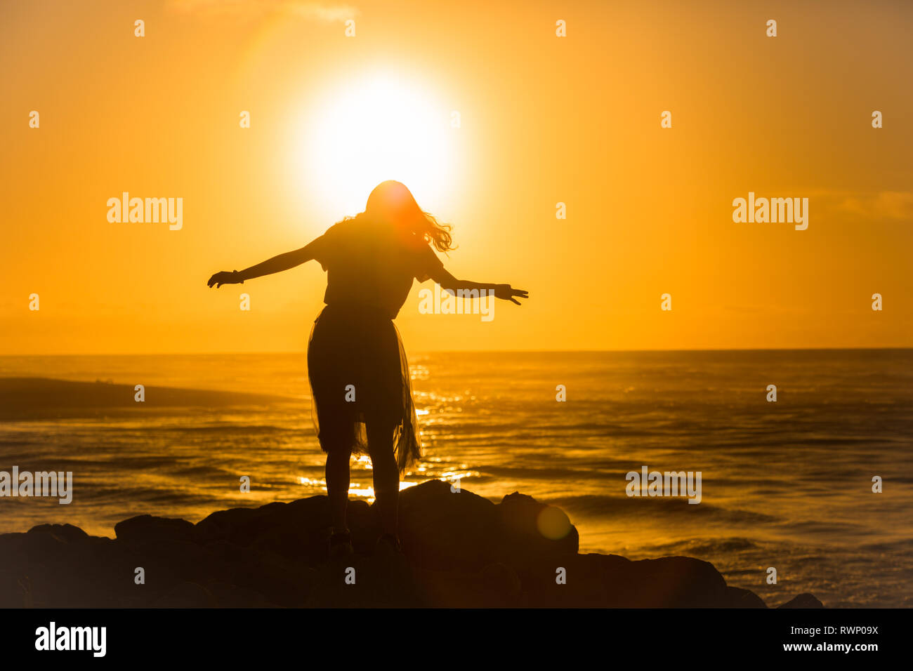 Posing at sunset hi-res stock photography and images - Alamy