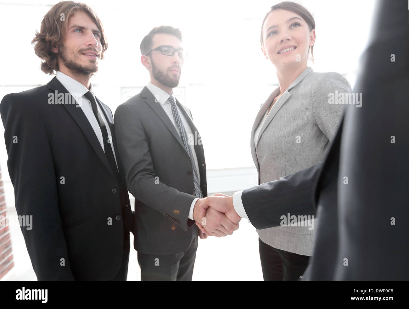 business team welcoming its investors Stock Photo - Alamy