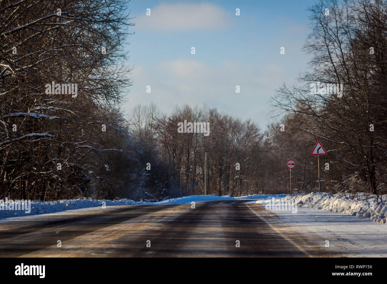 Snowy winter road. The road is covered up. Russian dear. Winter fairy ...