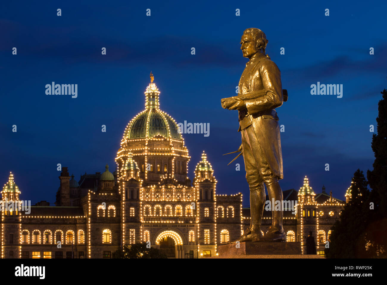 Statue of Captian Cook and BC provincial legislative buildings at ...
