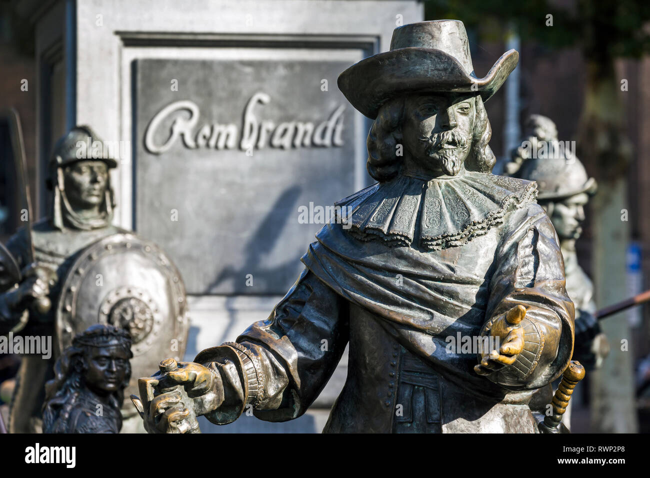Close-up of a bronze statue of Rembrandt in city square (the Night ...