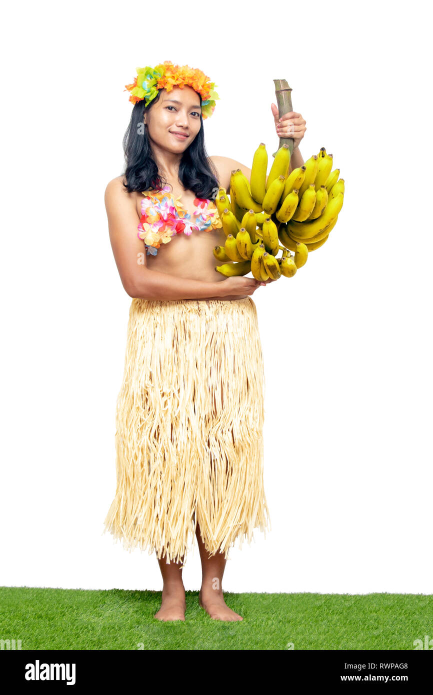 Hawaii Hula Dancer carries bunch of yellow bananas, isolated on white ...