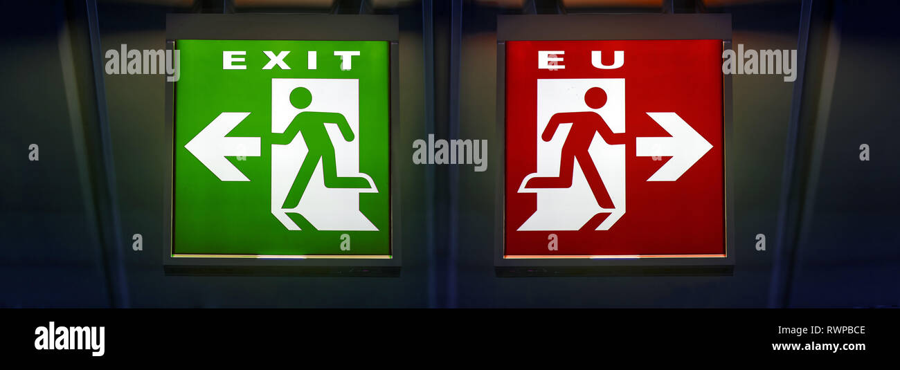 The emergency exit sign shows the direction of escape in case leave ...
