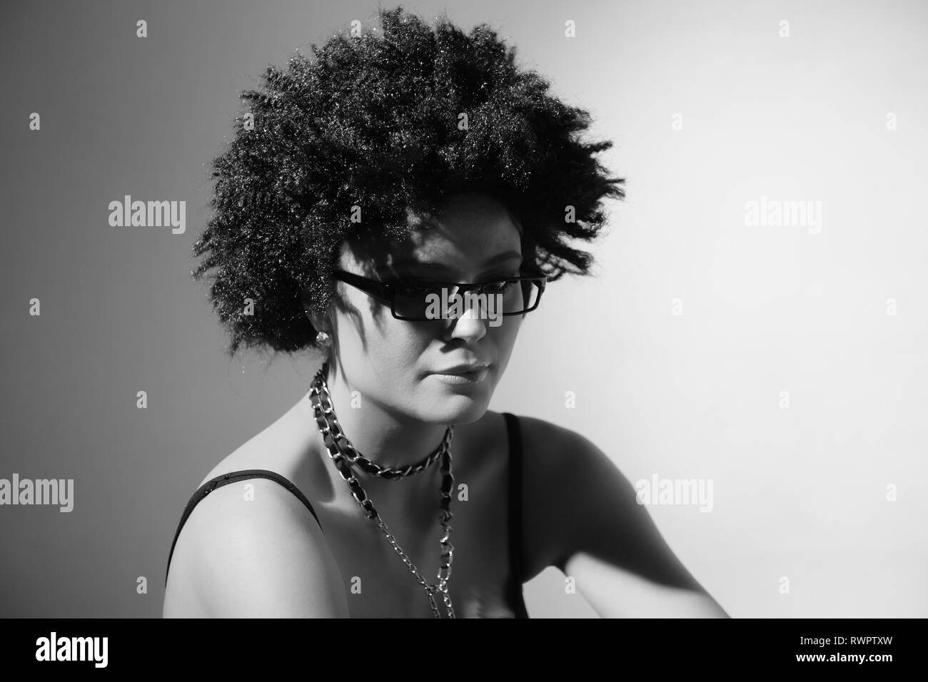 Black girl glasses afro Black and White Stock Photos & Images - Alamy
