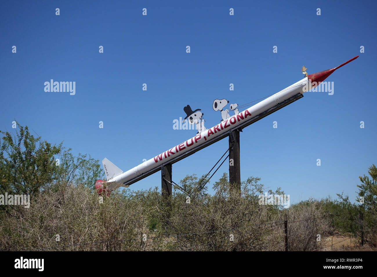 Sitting on a space vehicle entering the town of Wikieup, Arizona is ...