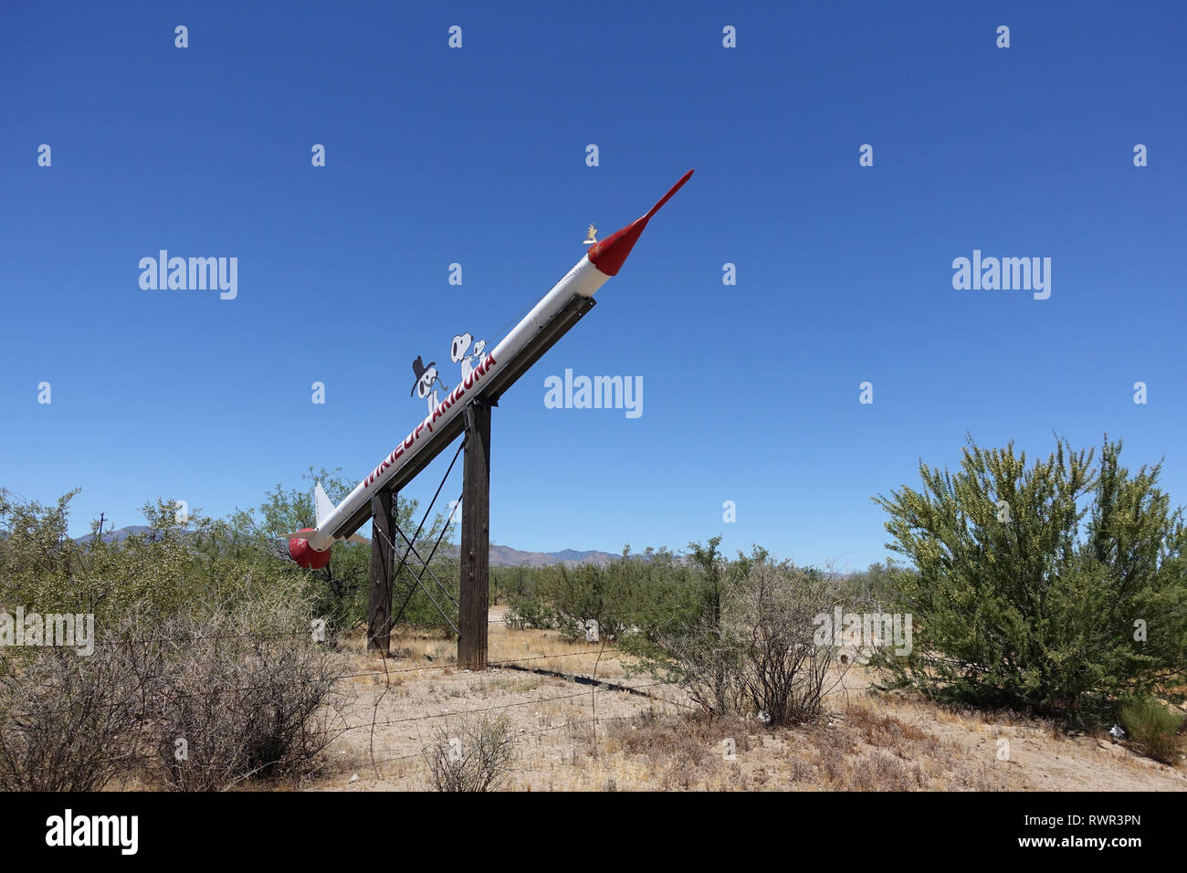 Sitting on a space vehicle entering the town of Wikieup, Arizona is ...