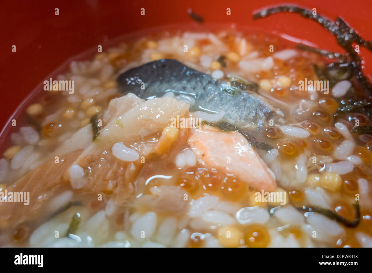 Close up shot of traditional Japanese style breakfast (Salmon Chazuke ...