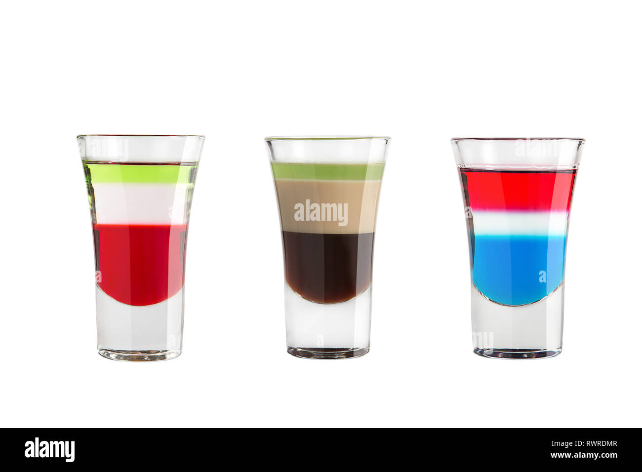 Alcohol shots on a white background. Three colorful shots. Isolated ...
