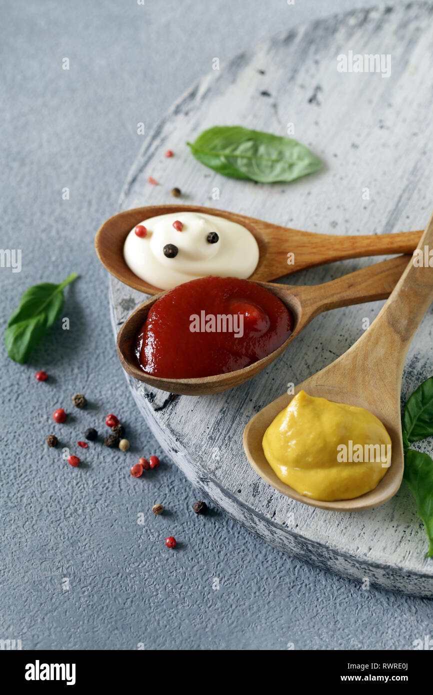three variants of ketchup, mustard and mayonnaise sauce Stock Photo - Alamy