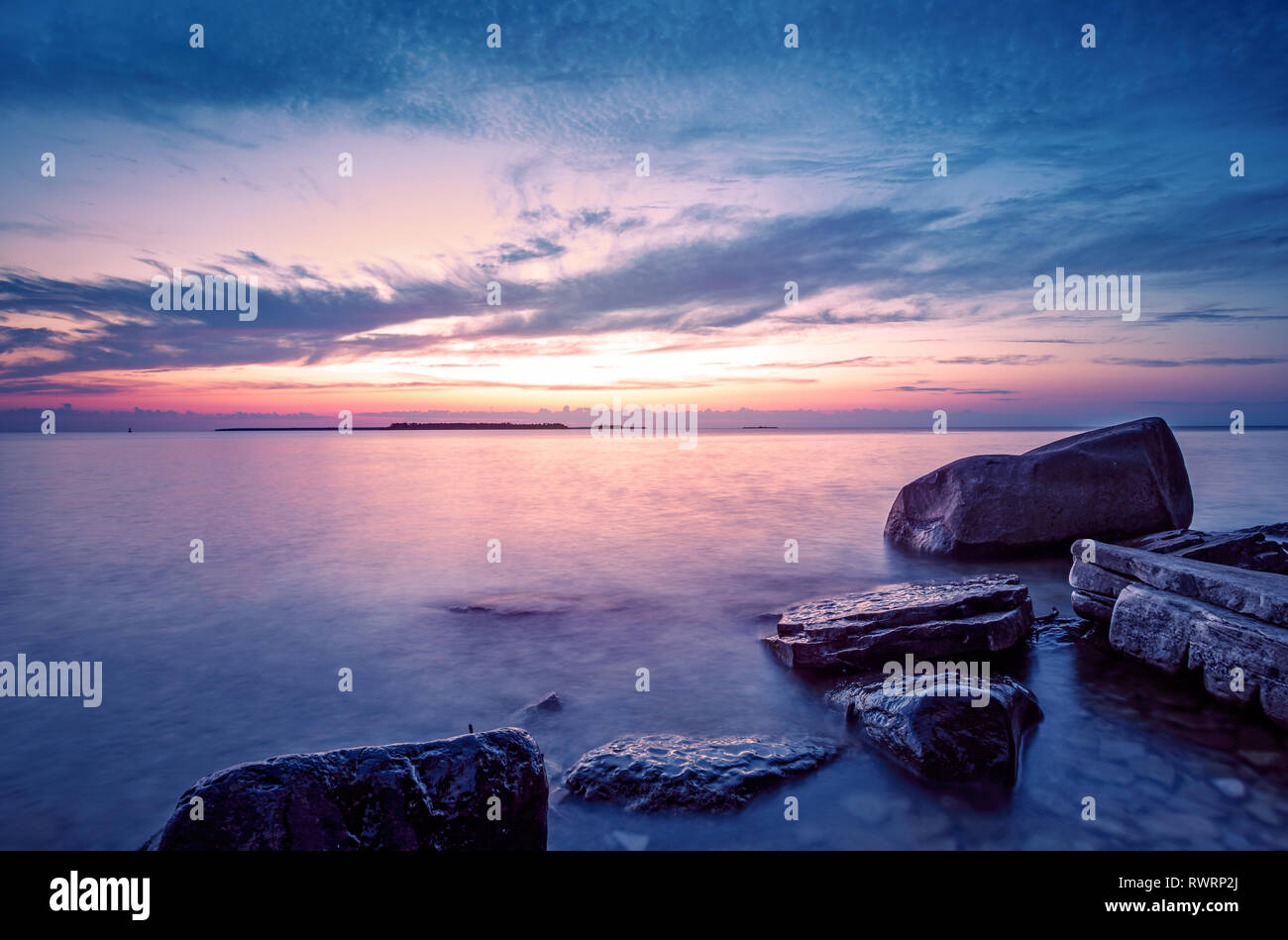 Dramatic coastal sunset. Blue hour on Lake Michigan at Peninsula State ...