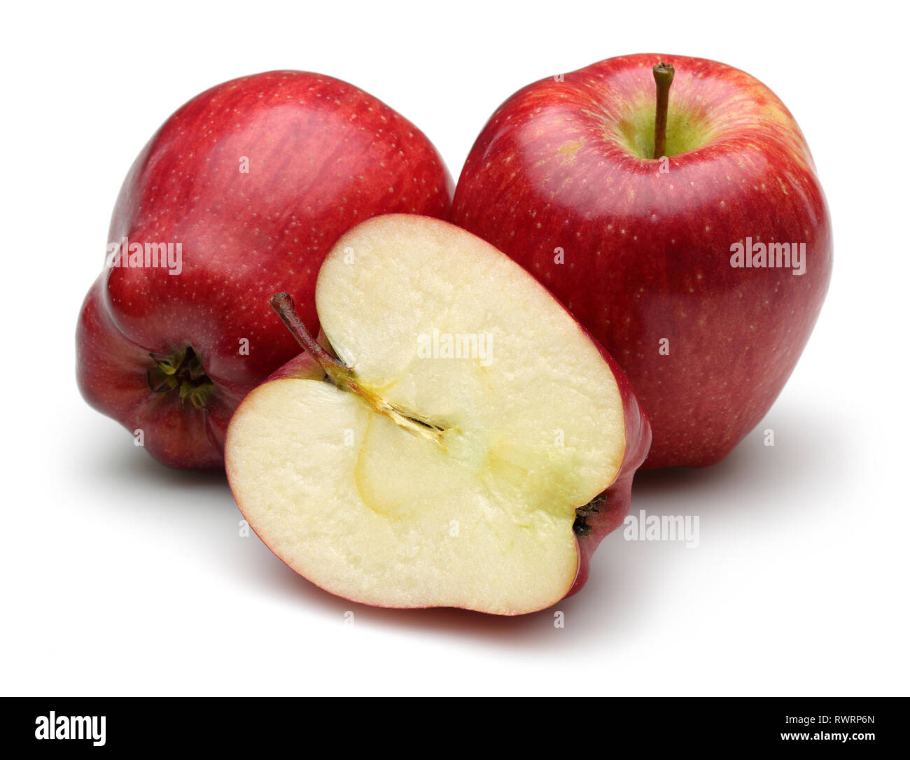 Whole and half red apples isolated on white background Stock Photo - Alamy