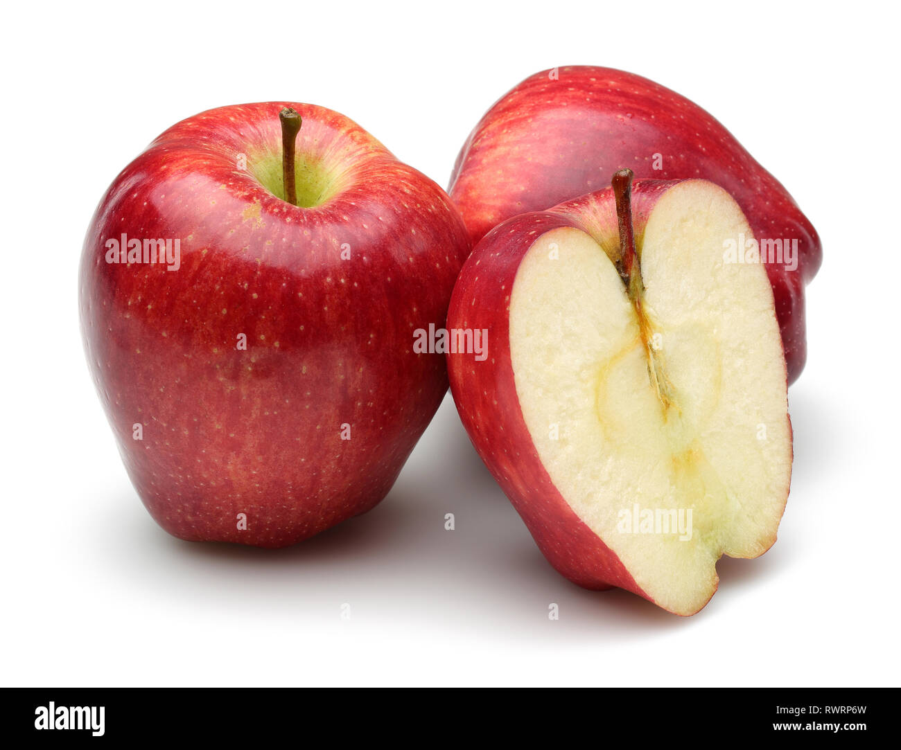 Whole and half red apples isolated on white background Stock Photo - Alamy