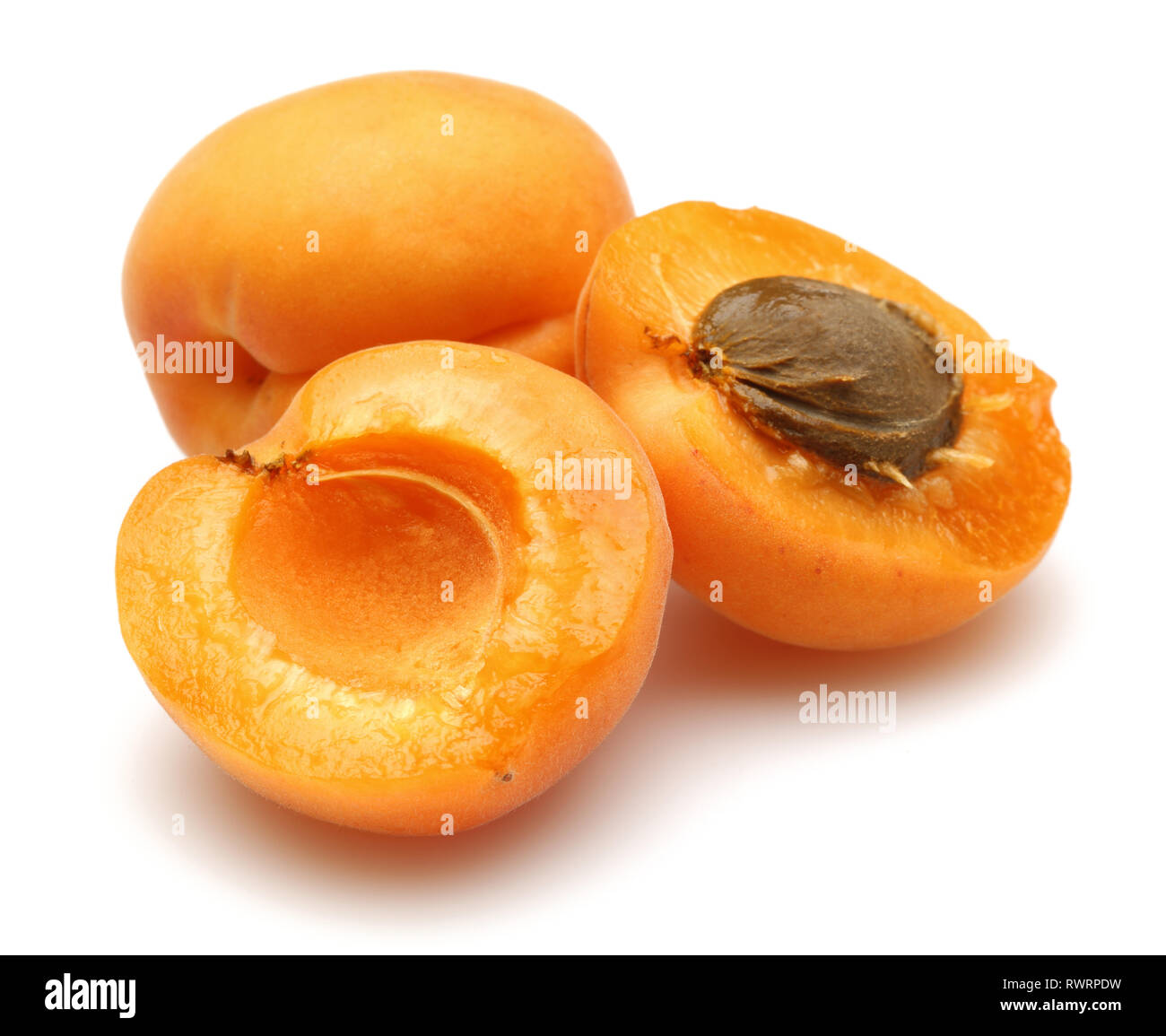 Fresh apricot fruits isolated on white background Stock Photo - Alamy