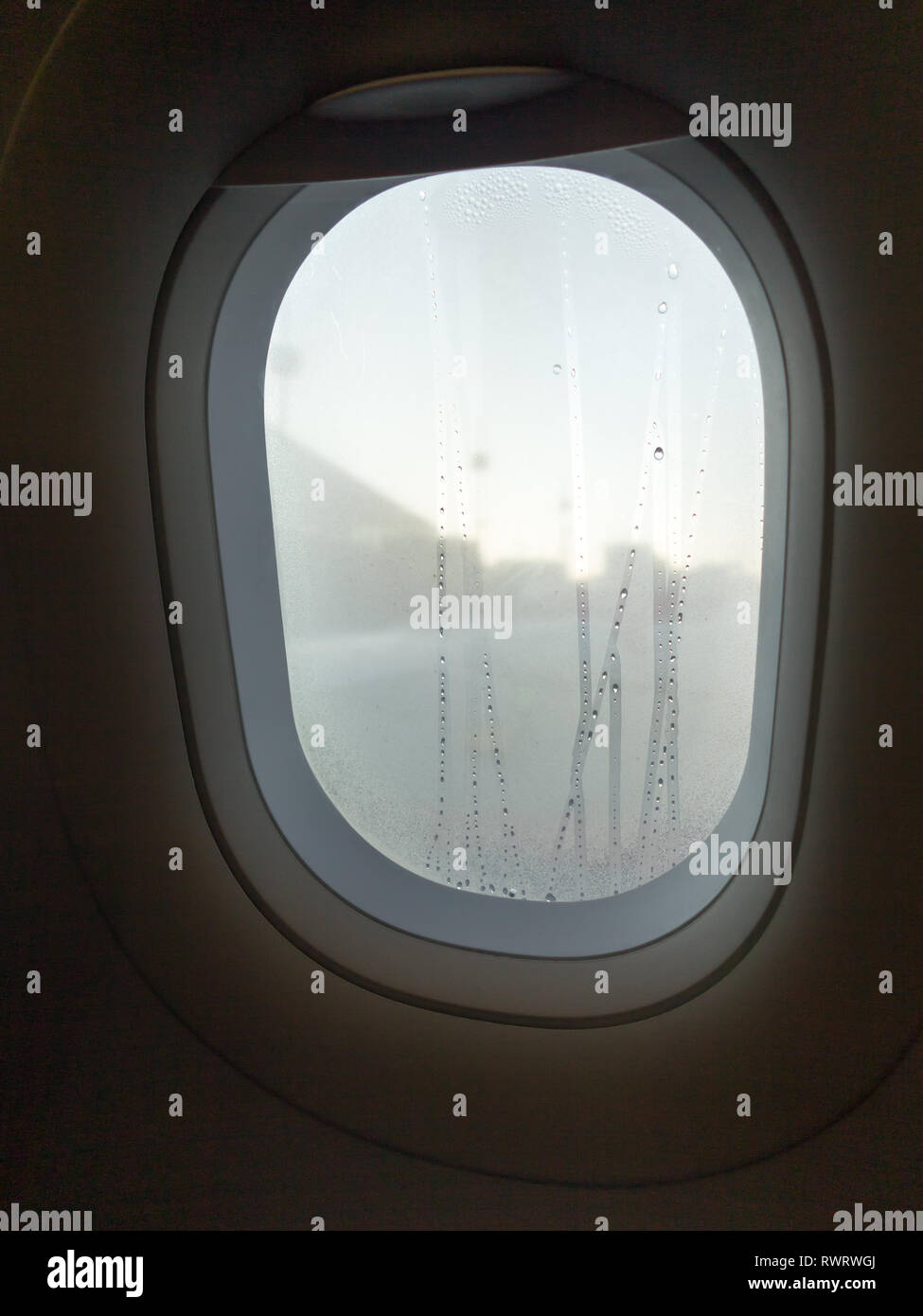 Closeup aircraft's porthole, window in cabin of airplane Stock Photo ...