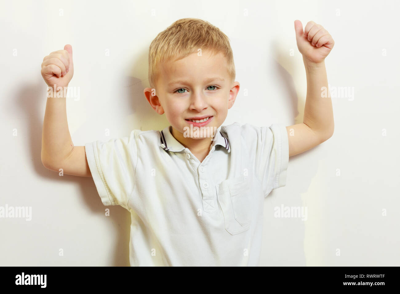Face expressions, children concept. Portrait of happy kid boy looking ...