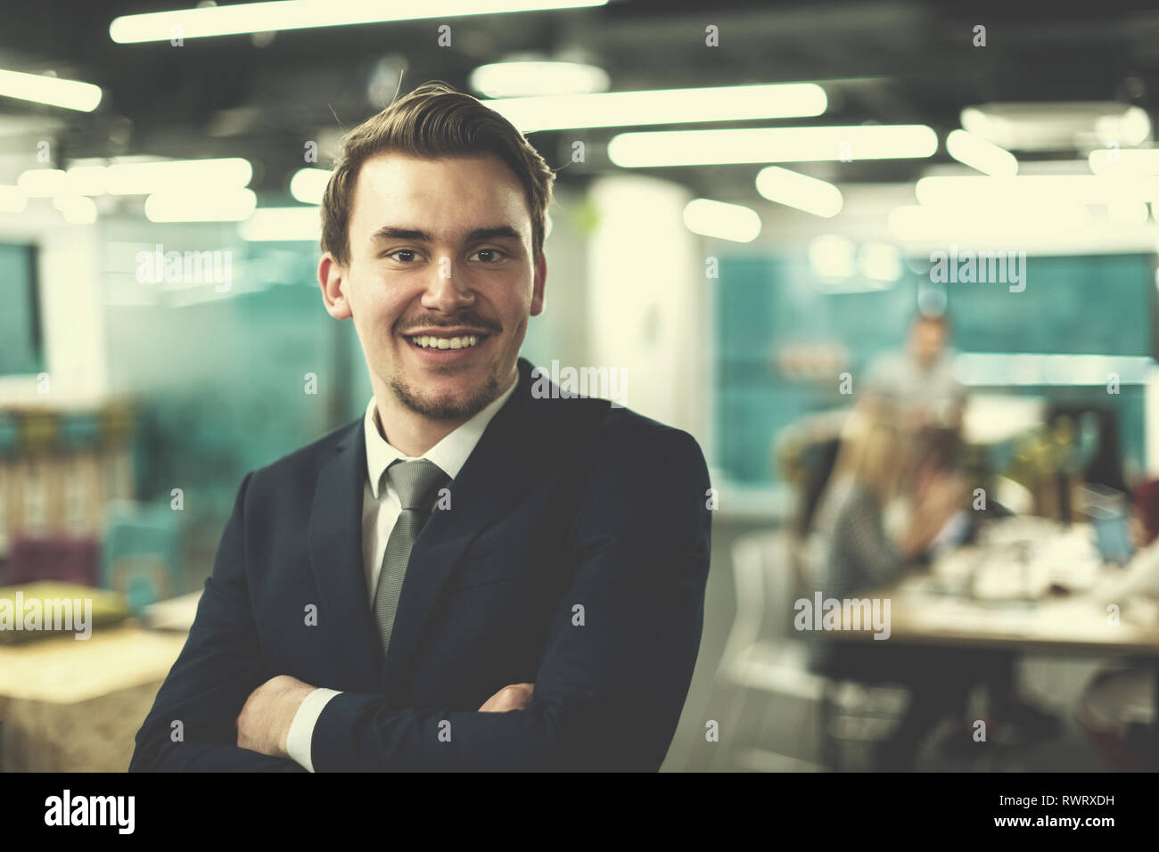 Portrait Of Successful Businessman Entrepreneur At Busy startup Office ...