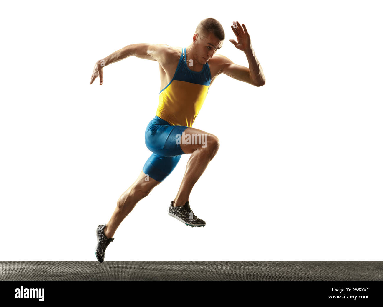 Young caucasian man running isolated on white studio background. One ...