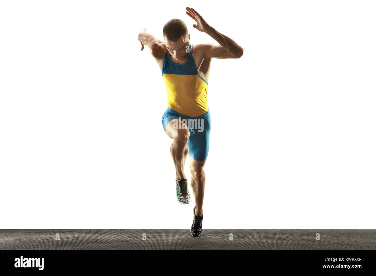 Young caucasian man running isolated on white studio background. One ...