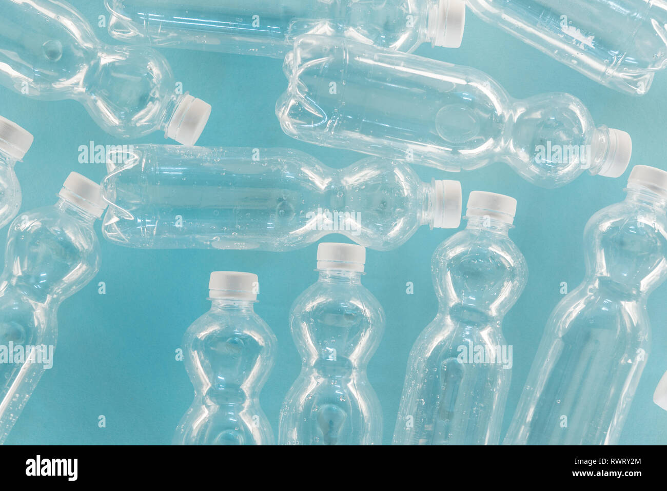 top view of empty plastic bottles isolated on turquoise Stock Photo - Alamy