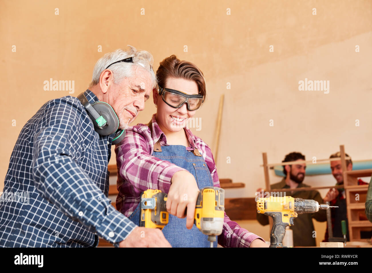 Carpenter training male apprentice hi-res stock photography and images ...
