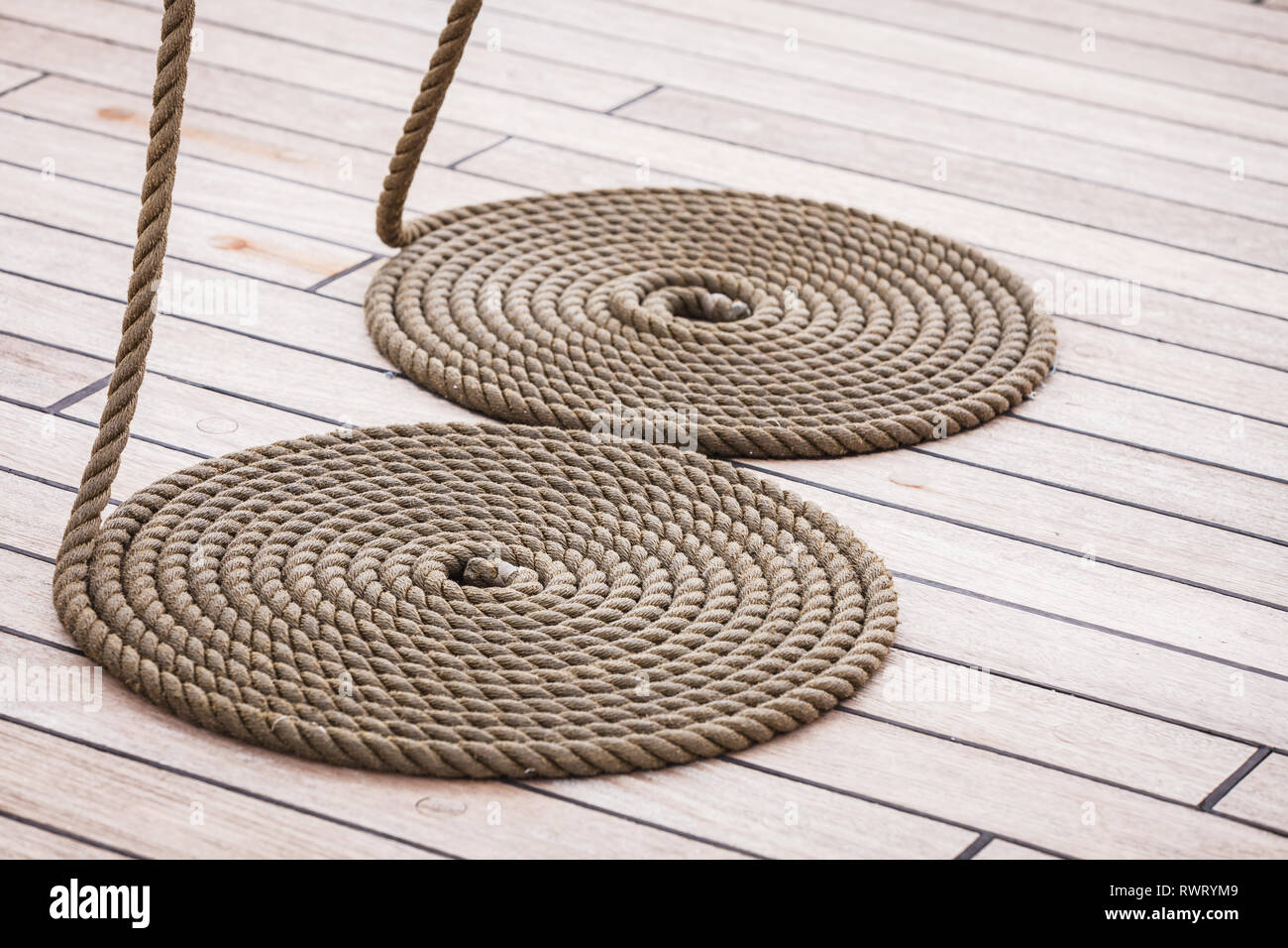 Old nautical objects concept. Circle rounded antique chest rope coil on ...