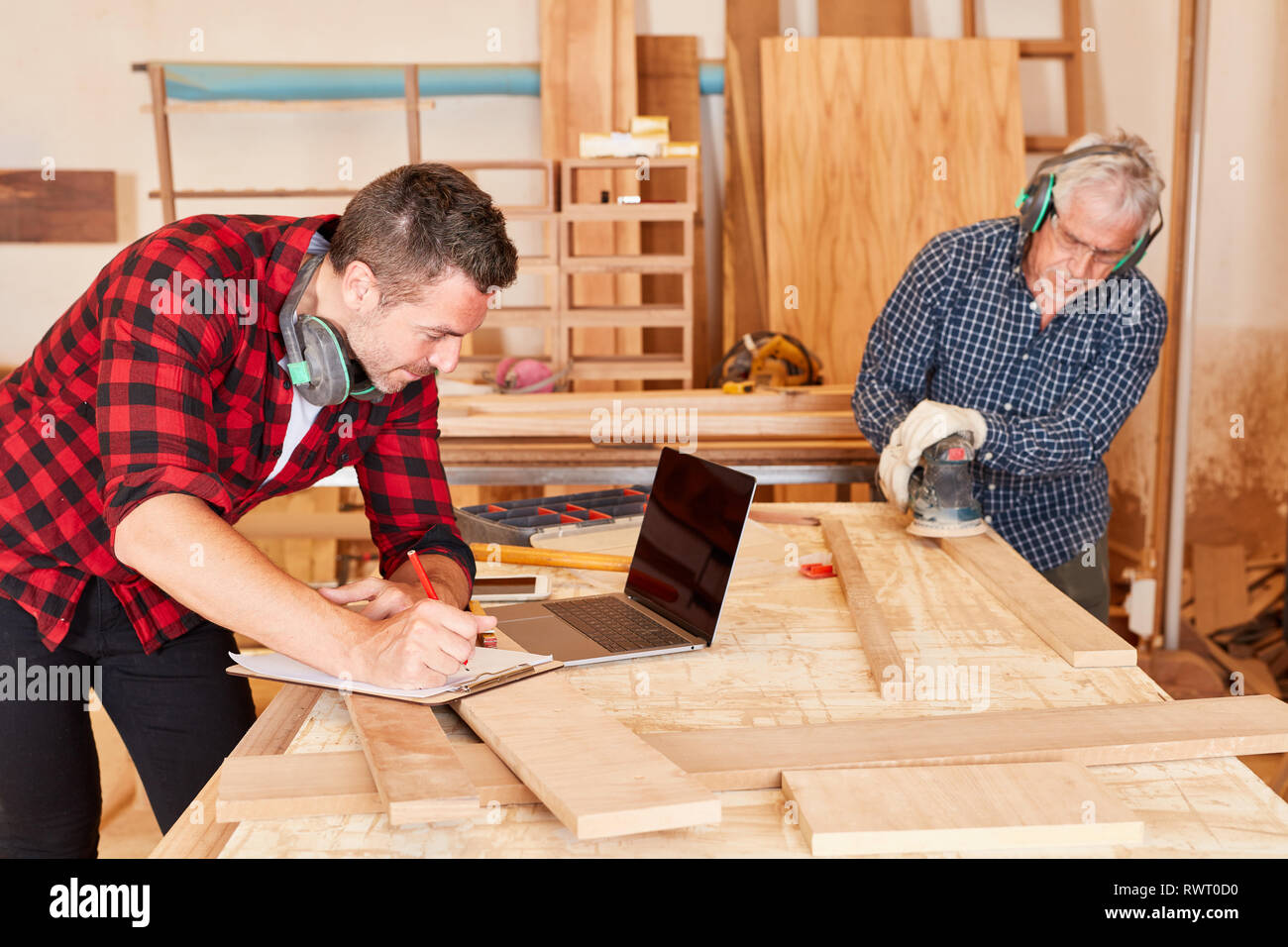 Carpenter team in the workshop during planning and woodworking Stock ...