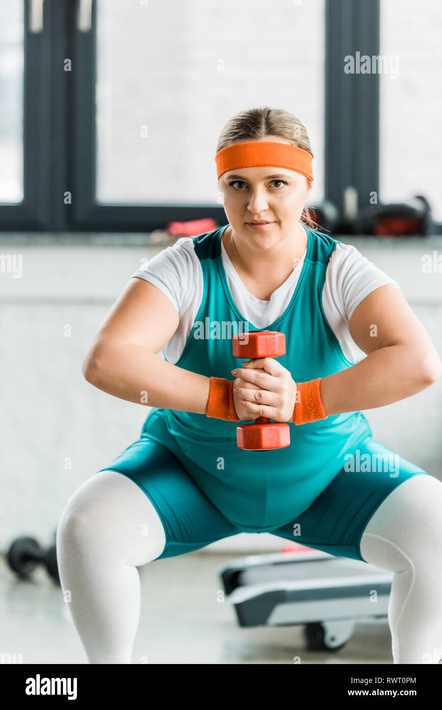 Sportswear squatting hi-res stock photography and images - Alamy