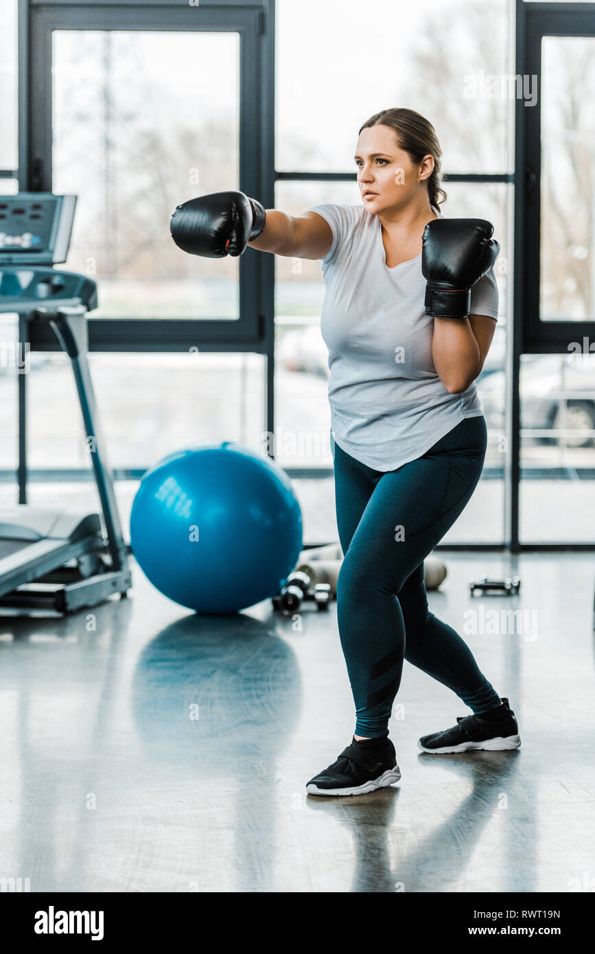 Attractive caucasian girl practicing boxing hi-res stock photography ...