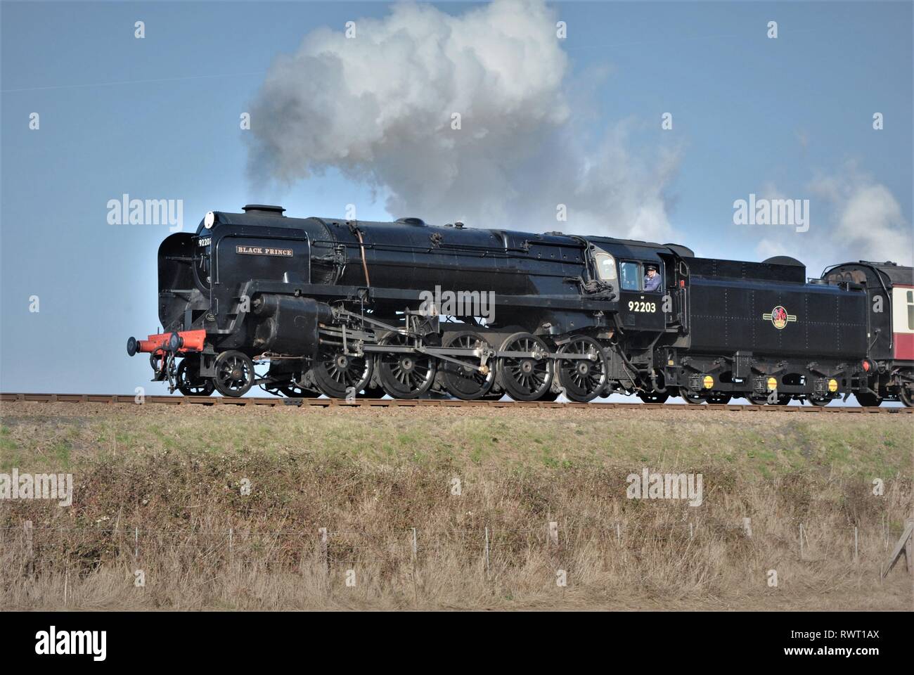 Black Prince, large black steam engine steaming through the countryside ...