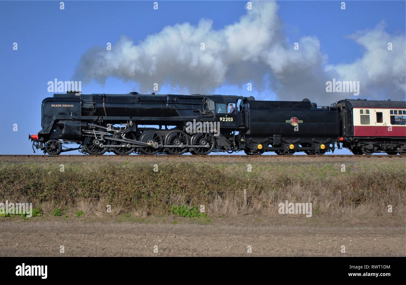 Black Prince, large black steam engine steaming through the countryside ...