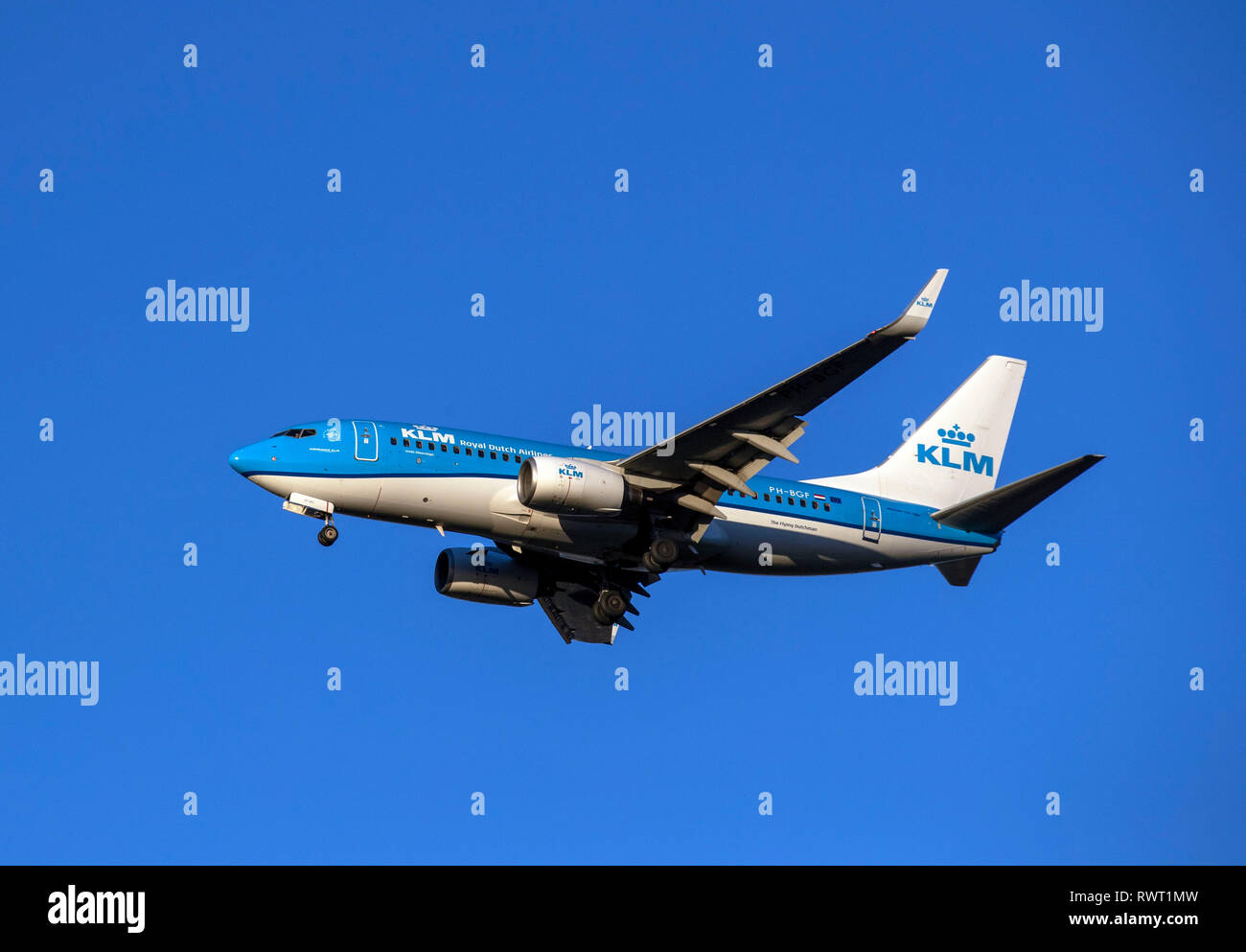 A KLM Boeing 737-700 plane lands at Heathrow Airport in West London ...