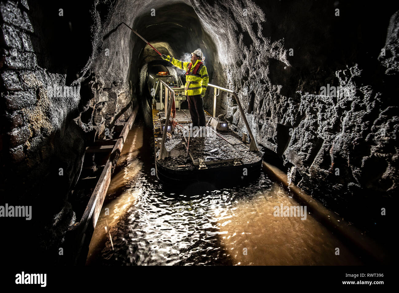 A member of the Canal & River Trust inspecting the Standedge Tunnel on ...