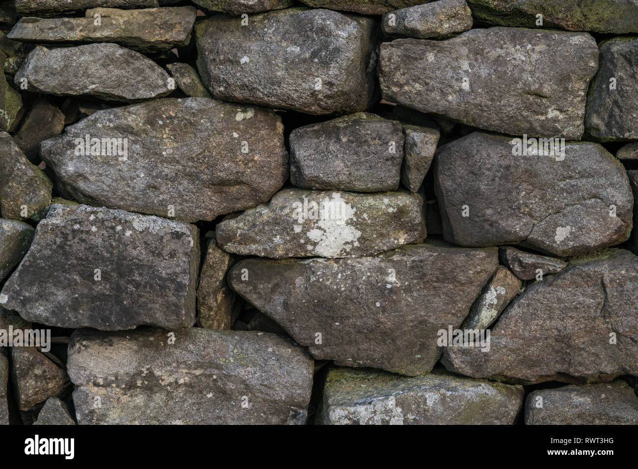 Detailed image of stone-wall face Stock Photo - Alamy