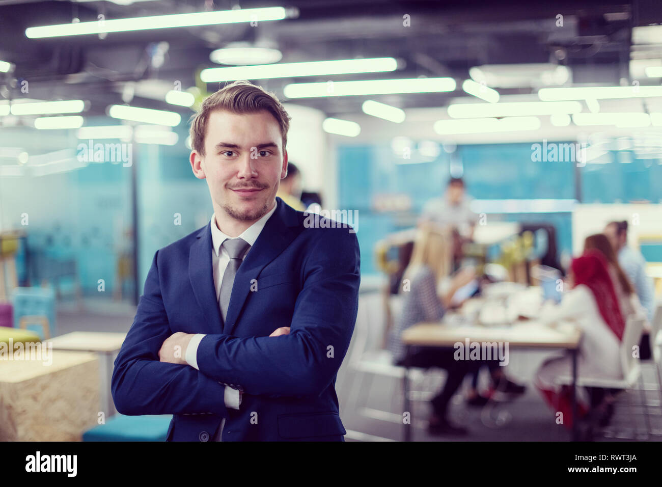 Portrait Of Successful Businessman Entrepreneur At Busy startup Office ...