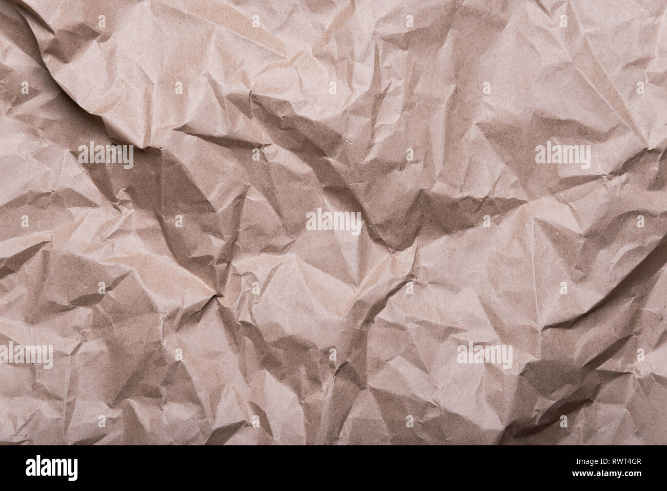 crumpled cream craft paper background texture Stock Photo - Alamy