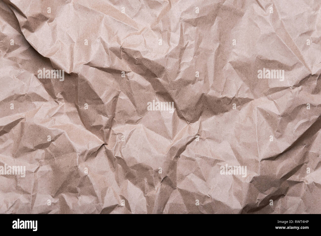 crumpled cream craft paper background texture Stock Photo - Alamy