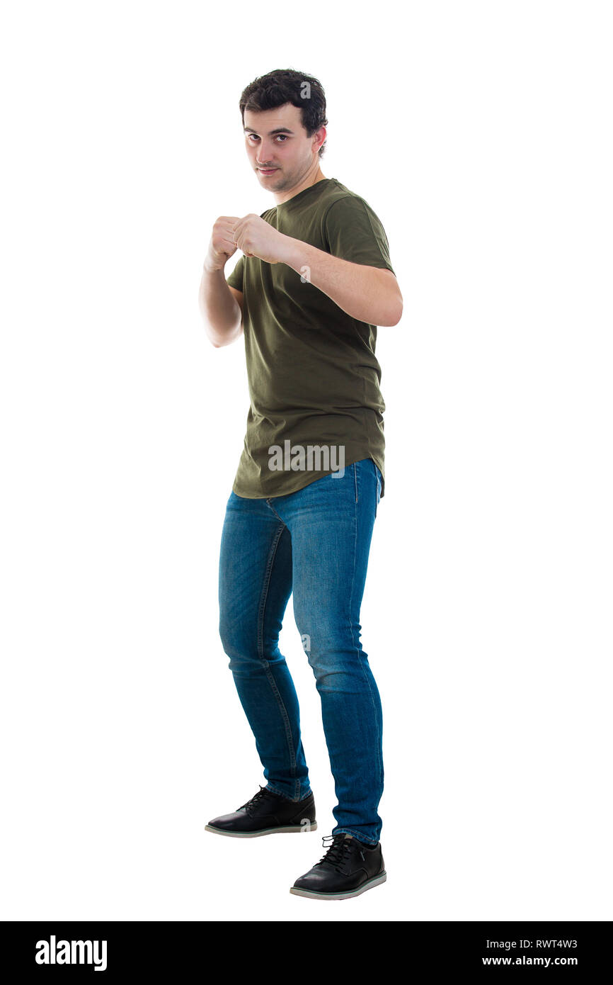 Full length portrait of casual angry young man ready for battle ...