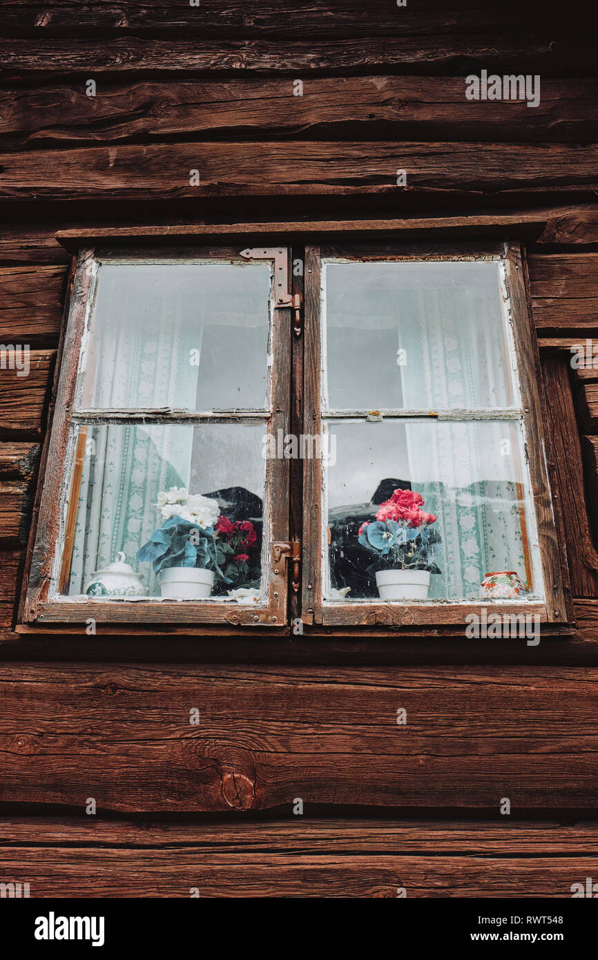 A timbered summer house window with decorations in Norway Stock Photo ...
