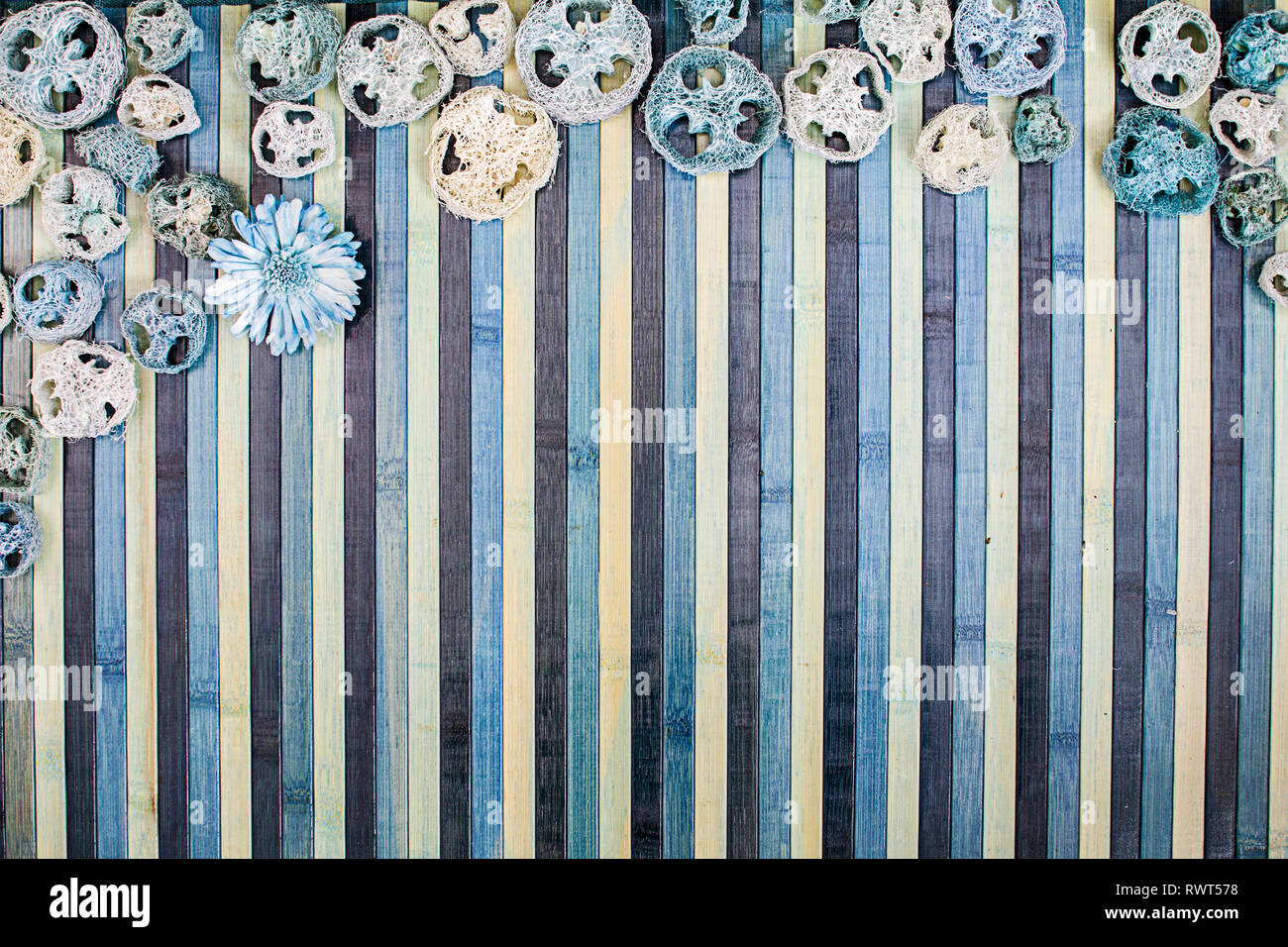 Background composition on wood in shades of light blue and blue with a ...
