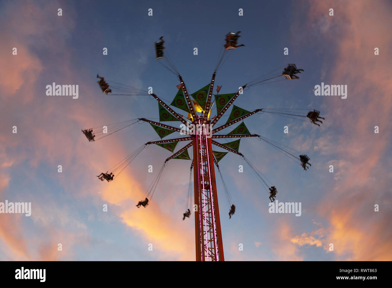 Amusement park rides at a local fairgrounds Stock Photo - Alamy