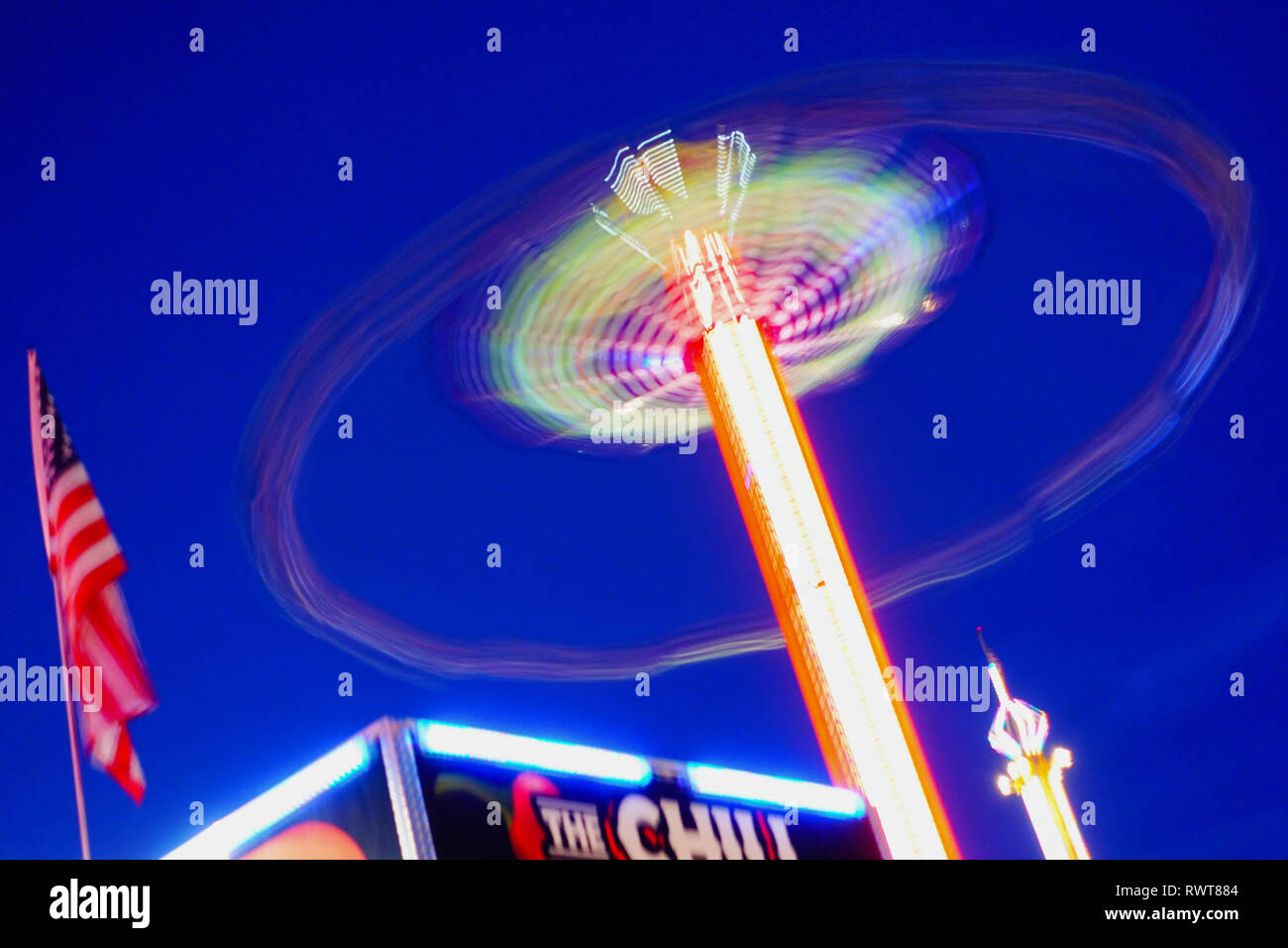 Amusement park rides at a local fairgrounds Stock Photo - Alamy