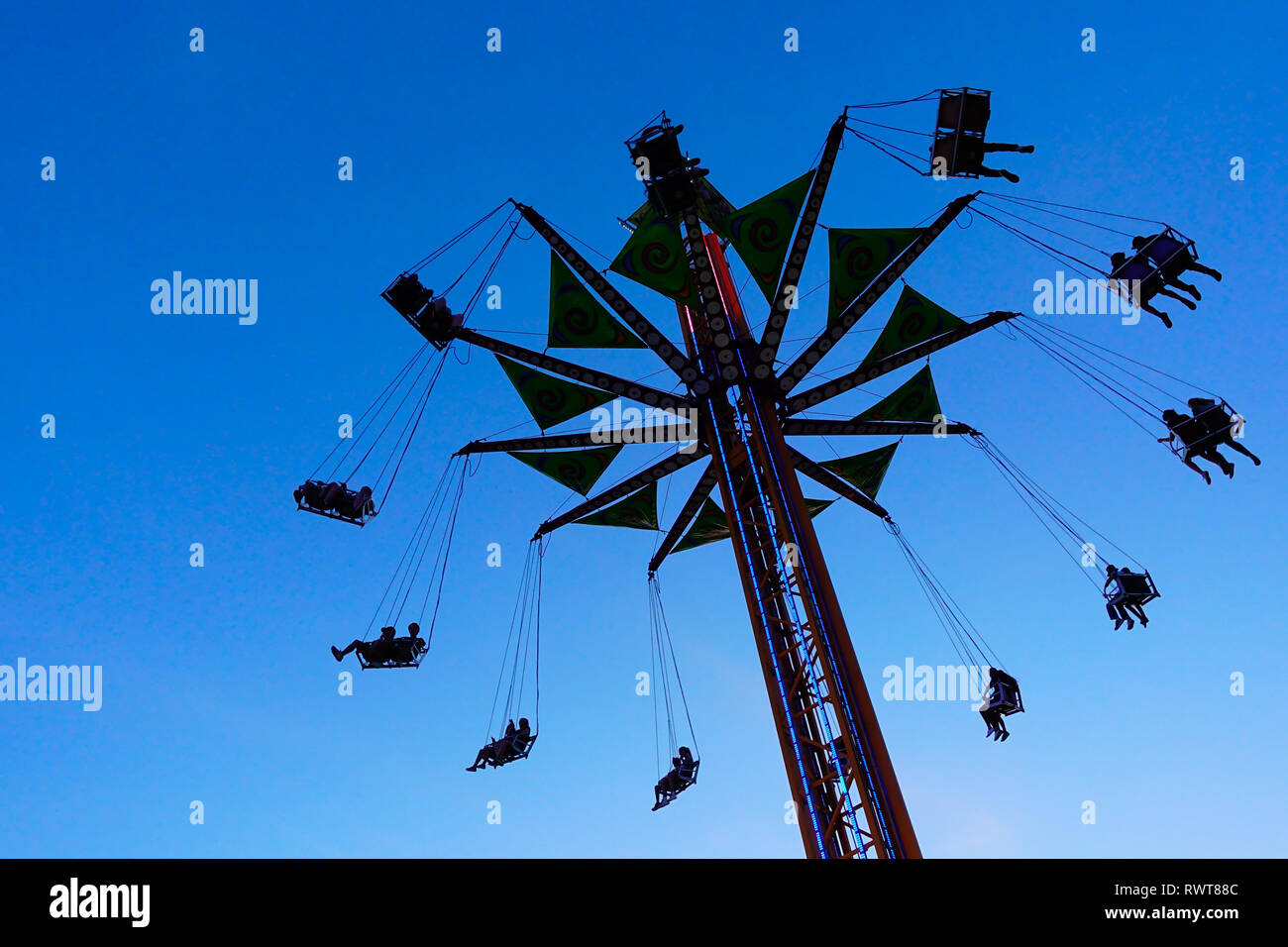 Amusement park rides at a local fairgrounds Stock Photo - Alamy