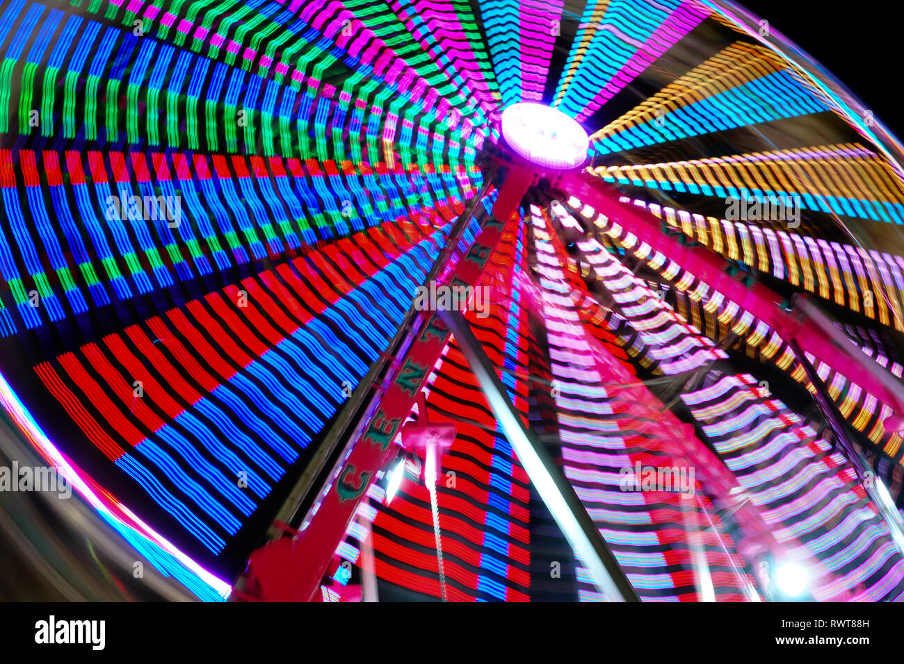 Amusement park rides at a local fairgrounds Stock Photo - Alamy