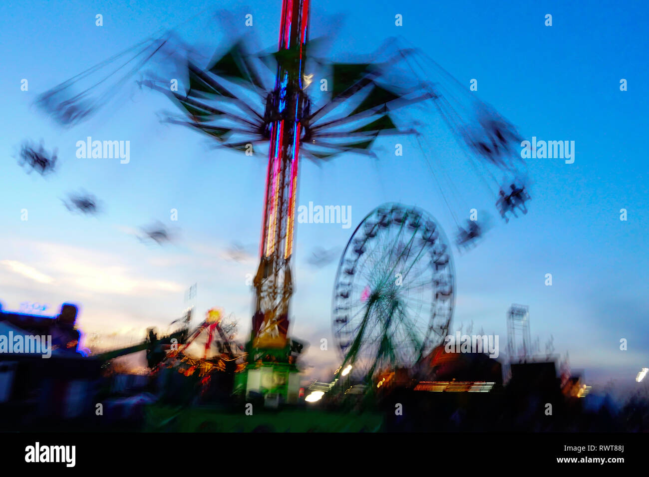Amusement park rides at a local fairgrounds Stock Photo - Alamy