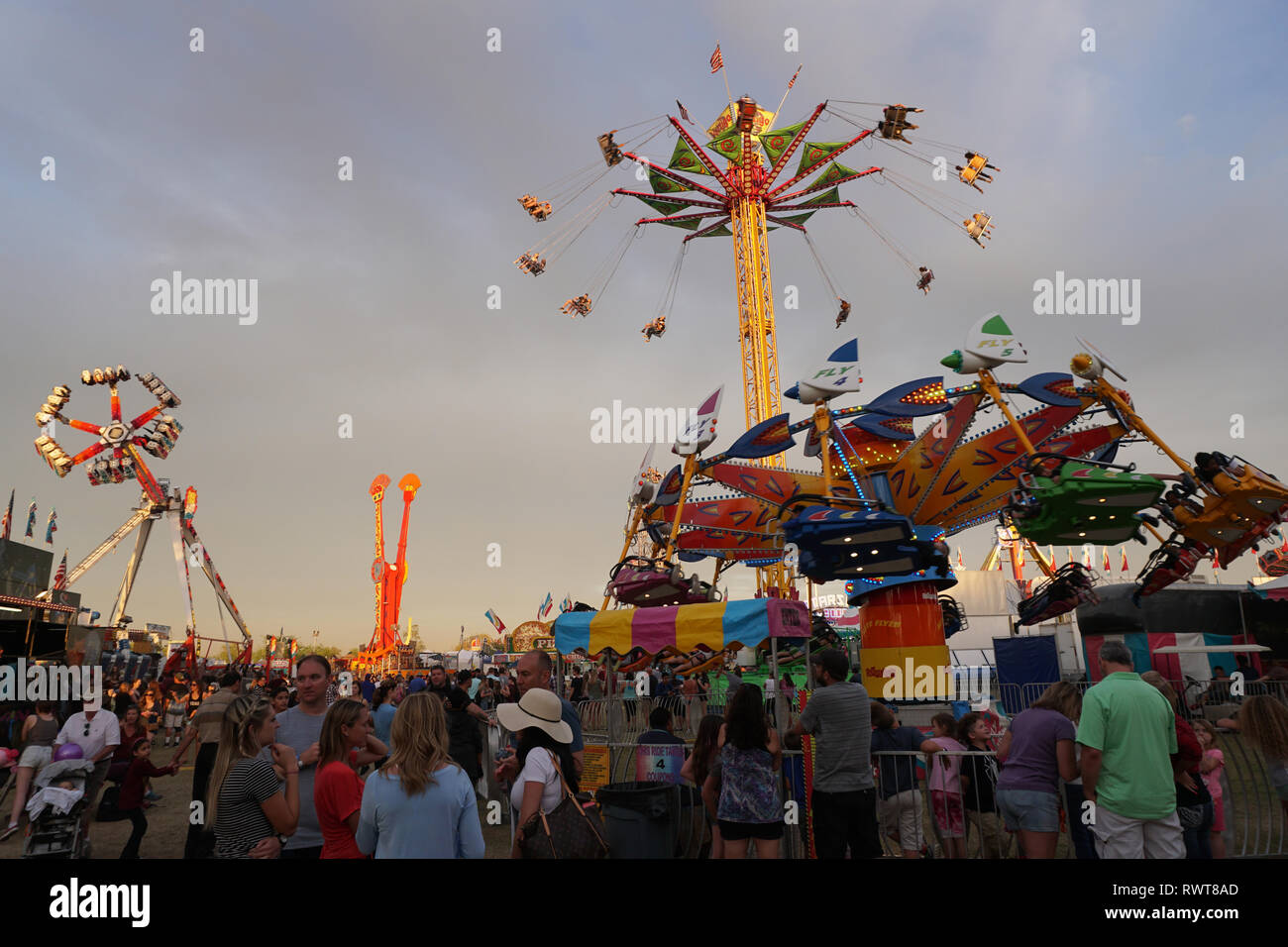Amusement park rides at a local fairgrounds Stock Photo - Alamy