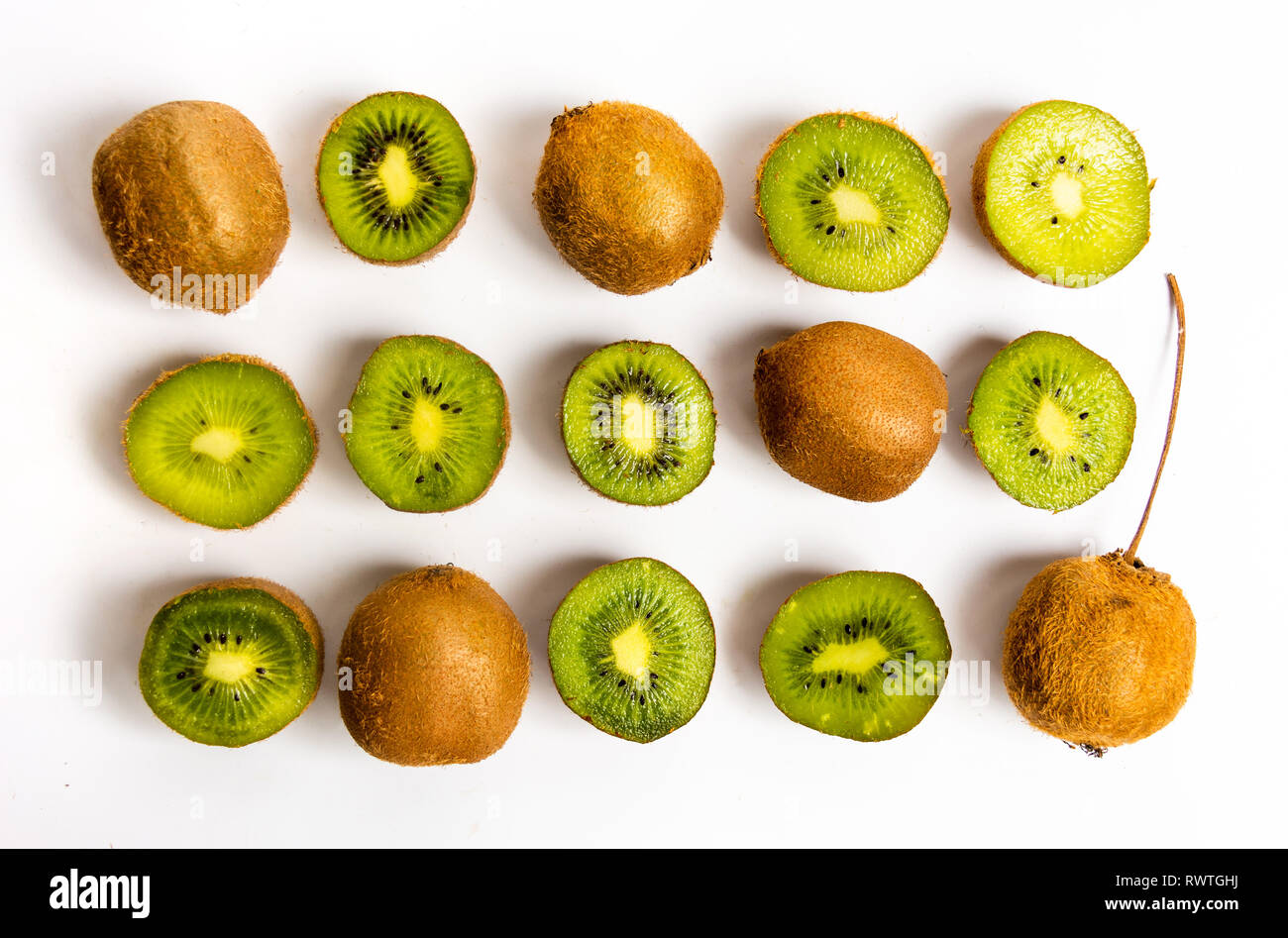 Kiwi fruits on white background top view Stock Photo - Alamy