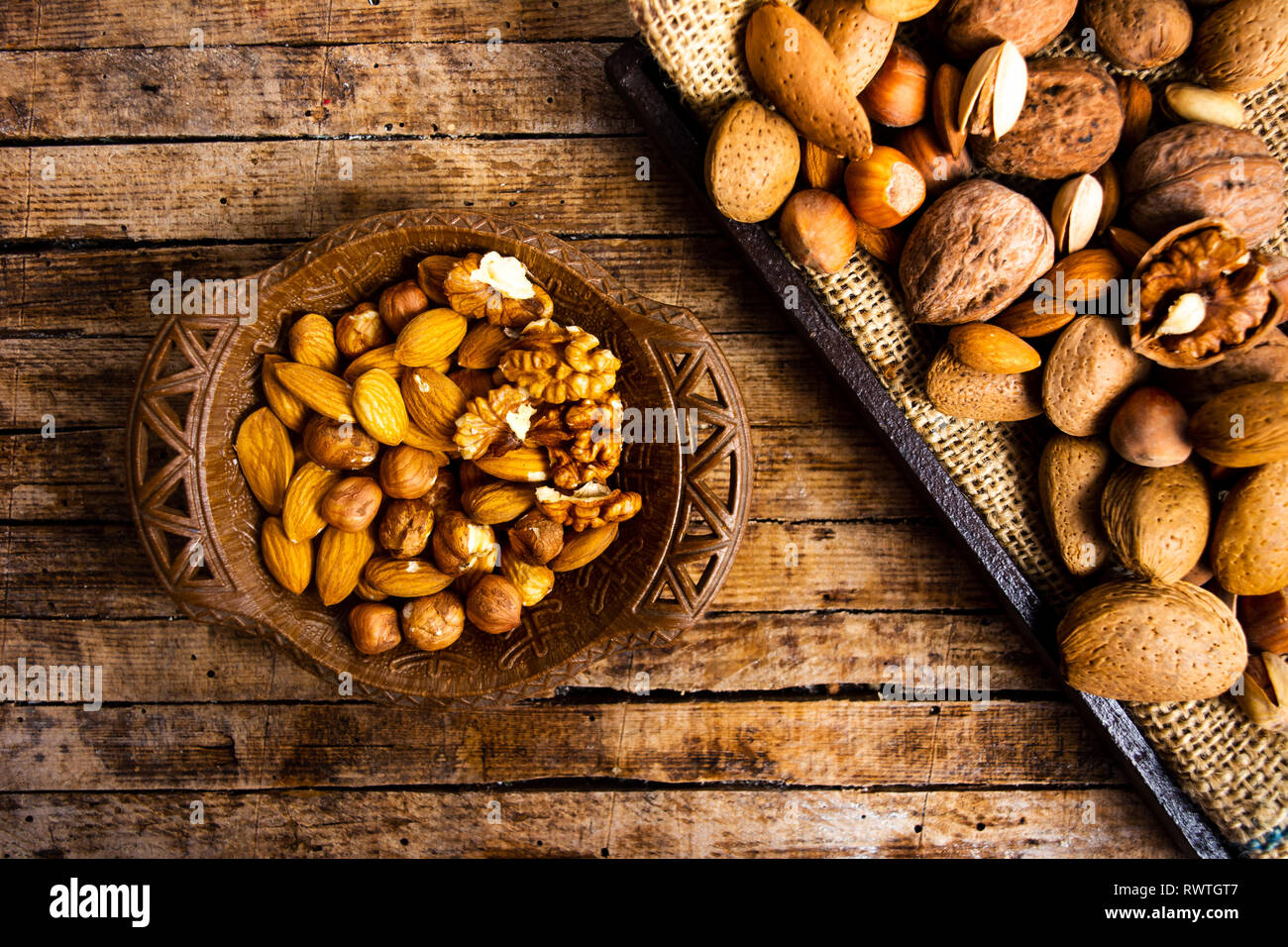 Various nuts on a pile top view, healthy food Stock Photo - Alamy