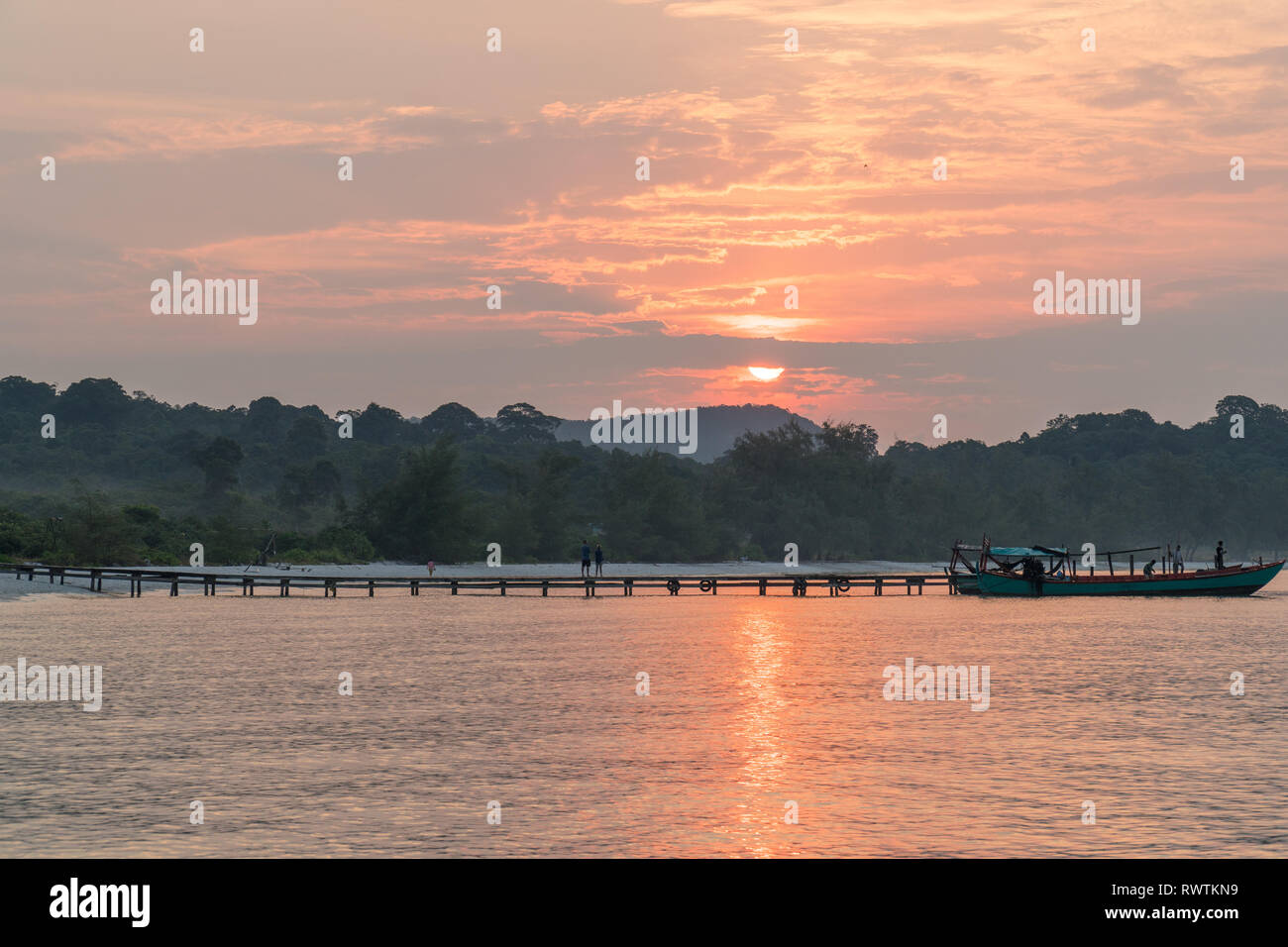 The sun is rising at Sok San Beach on Koh Rong island in Cambodia Stock ...